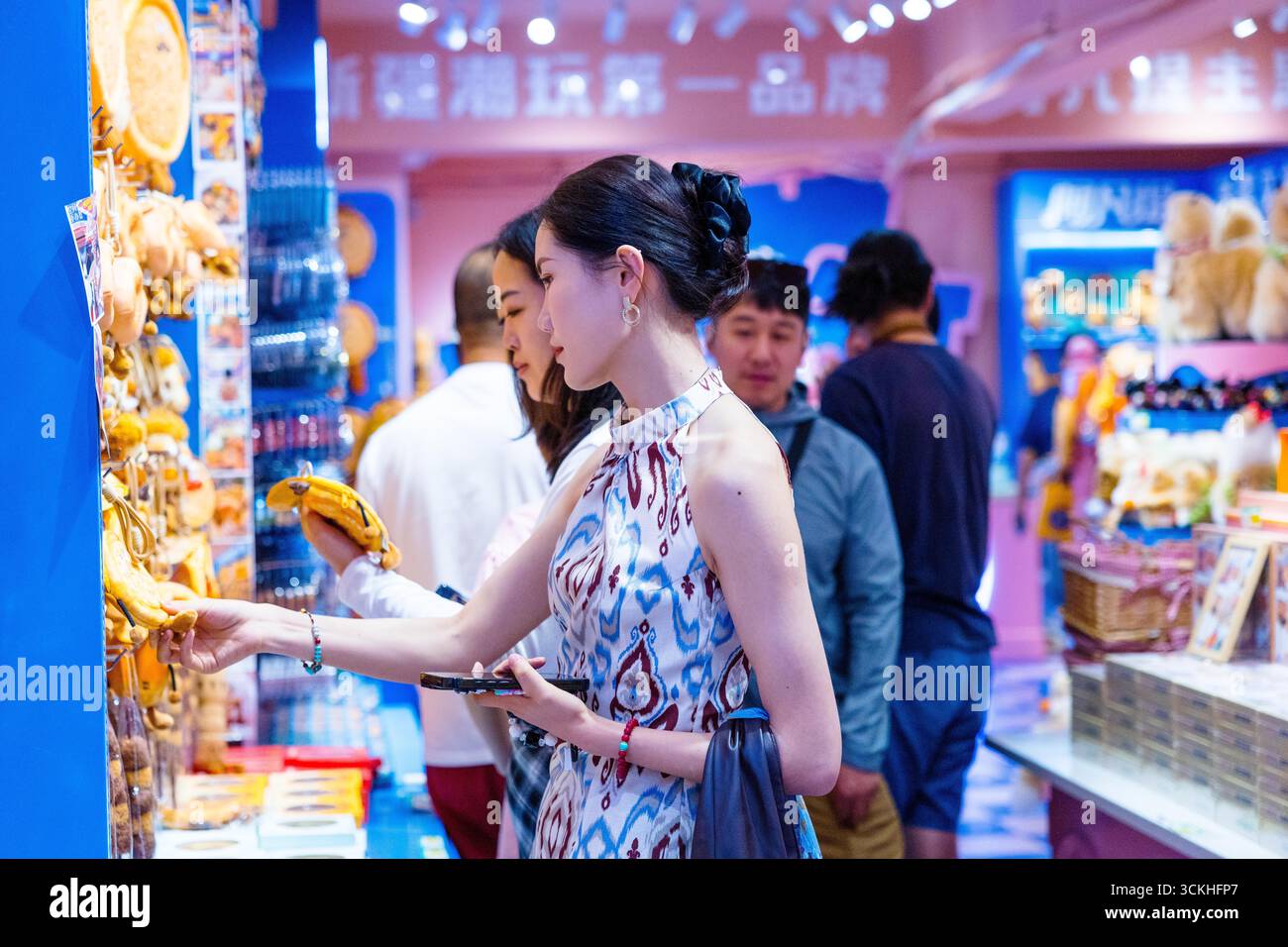 Tourists visit the Grand Bazaar in Urumqi City, northwest China's ...