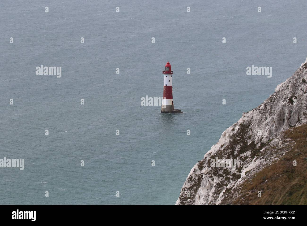 Beachy Head lighthouse at the base of the cliffs Stock Photo - Alamy