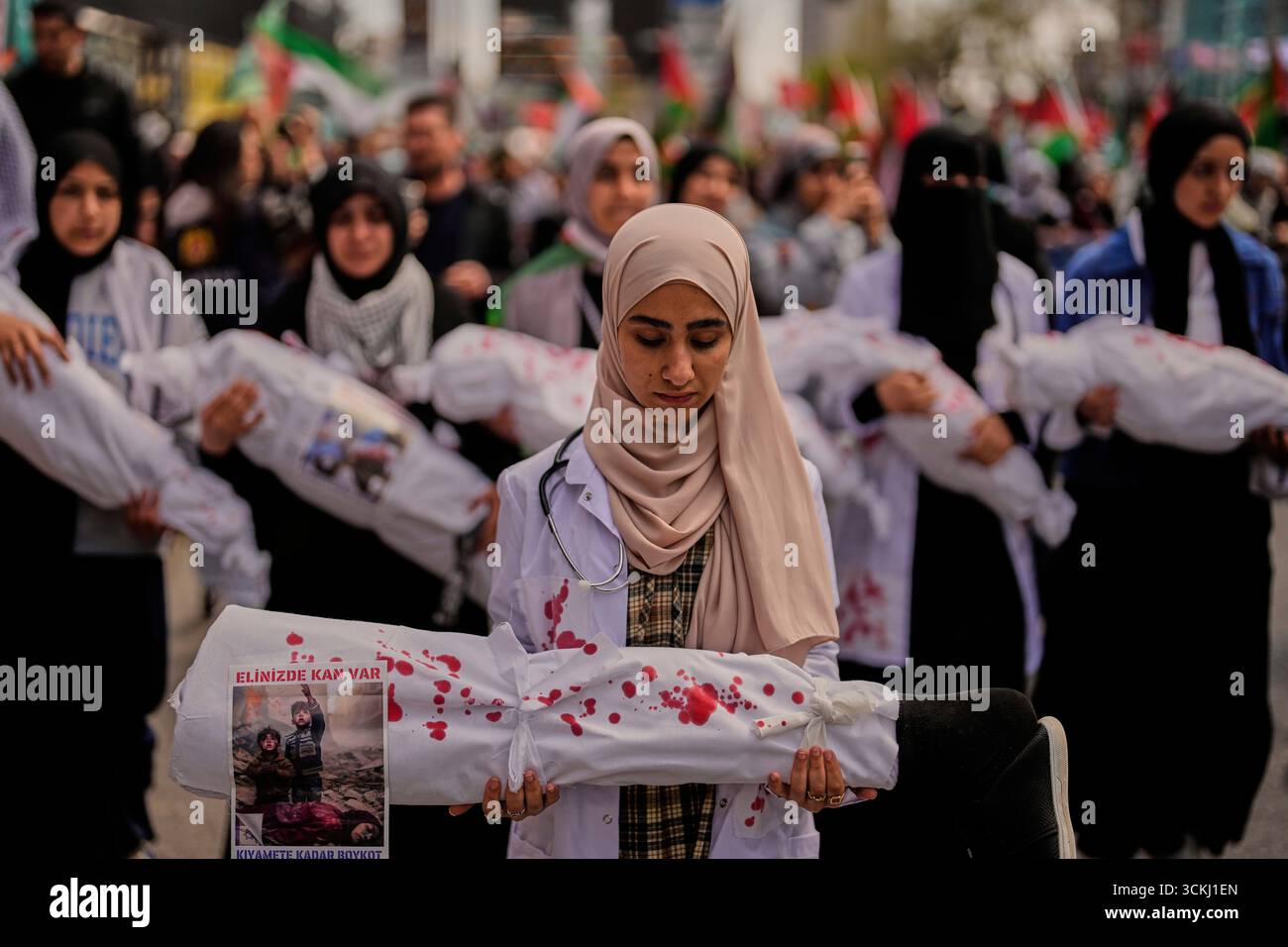 FILE - Protesters hold mock coffins during a pro-Palestinian protest ...