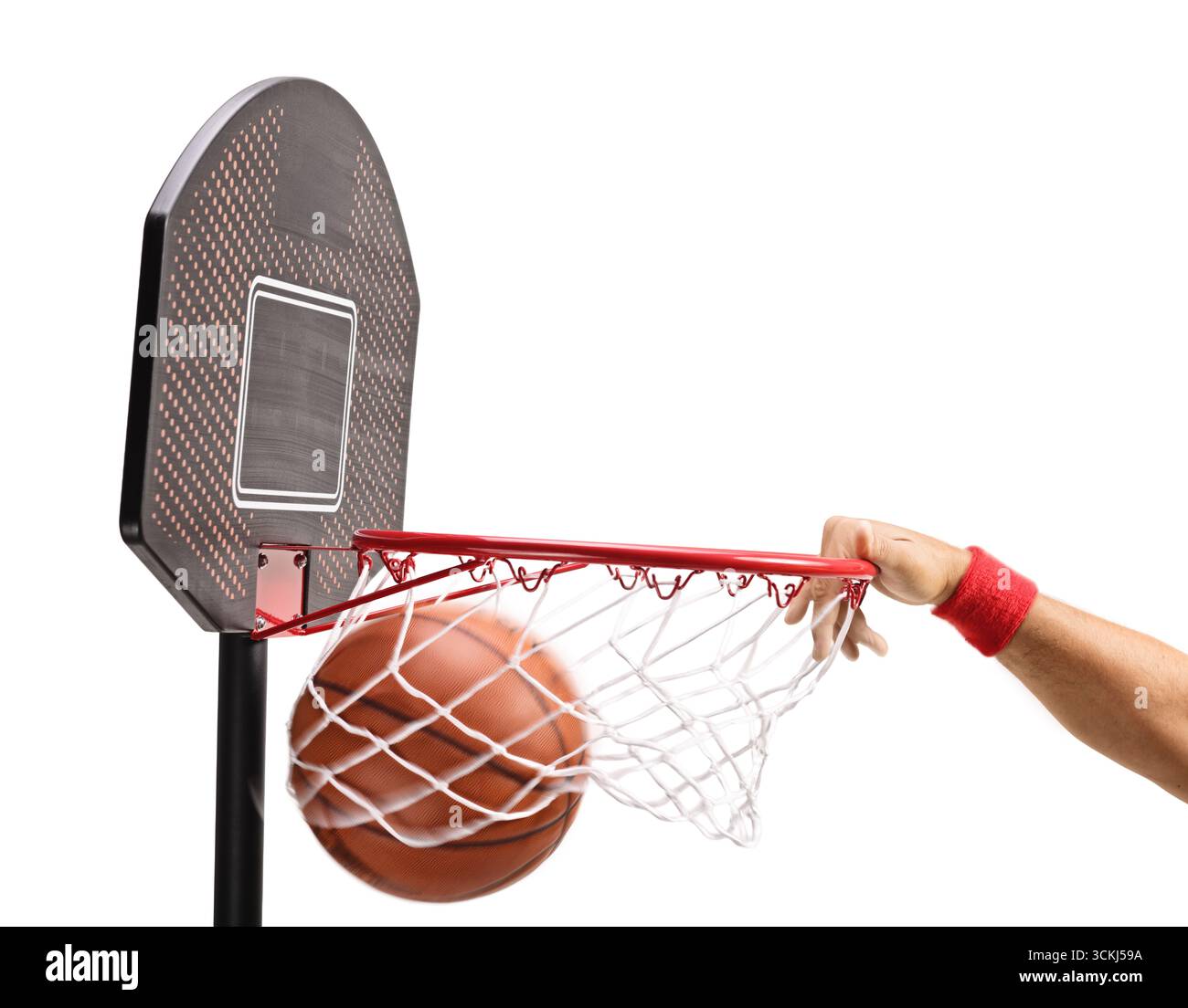 Basketball action, slam dunking the ball through the hoop with one hand ...