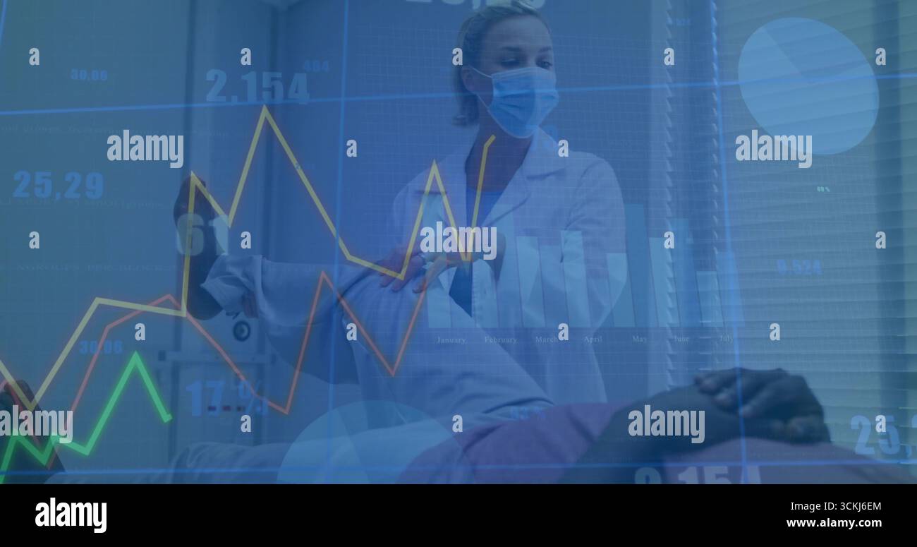 Checking patient wrist pulse masked doctor wearing lab coat on exam ...