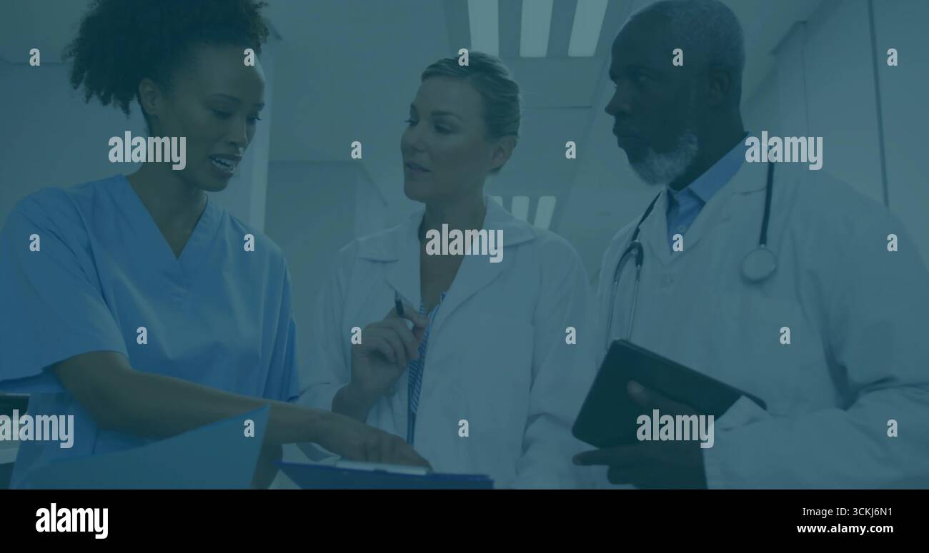 Reviewing staff wearing lab hi-res stock photography and images - Alamy