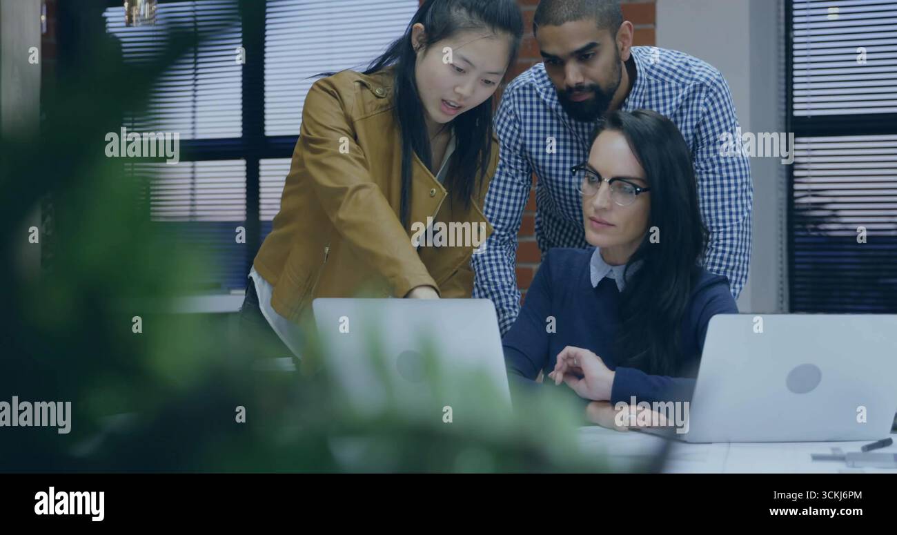 Pointing asian professional guiding hi-res stock photography and images ...