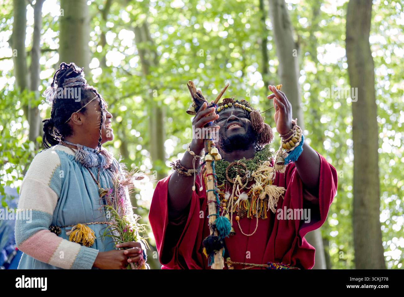 (from left) 'Queen Nandi' and 'King Atehene' at their campsite in woods ...