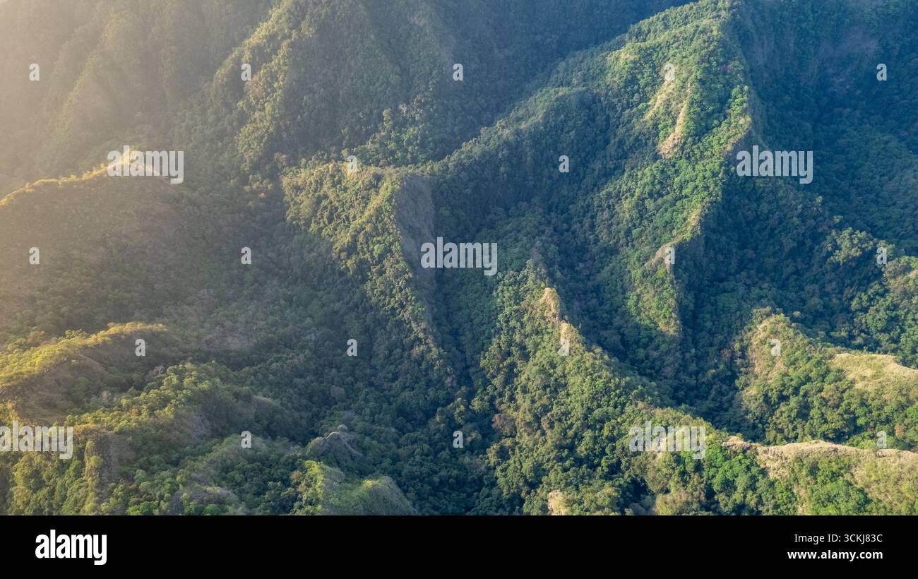 Aerial View of Mountain Ridges with Sunlight and Lush Green Forest ...