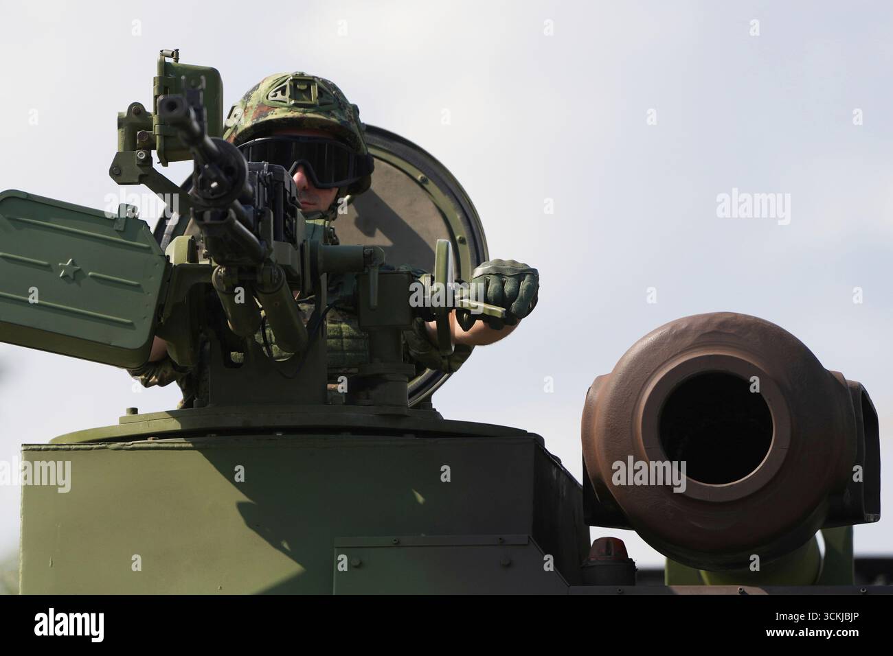 A Serbian Army soldier prepares ahead of a military parade scheduled ...