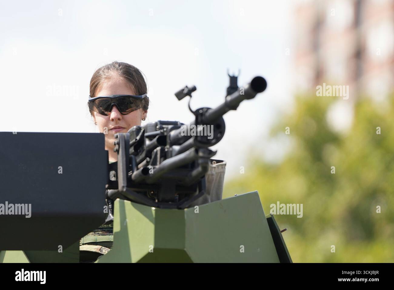 A Serbian Army soldier prepares ahead of a military parade scheduled ...