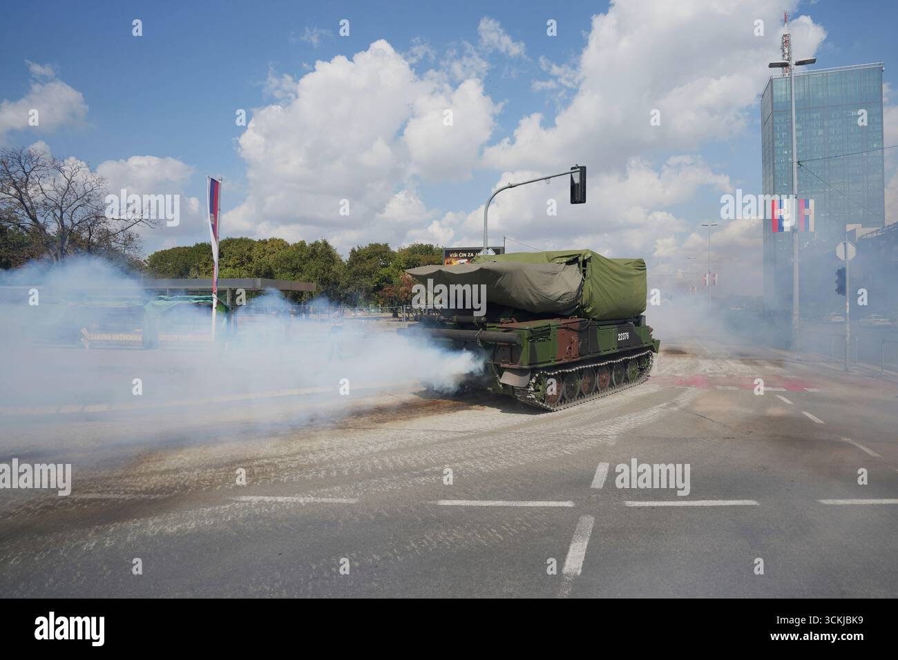 Serbian Army vehicles drive ahead of a military parade scheduled for ...