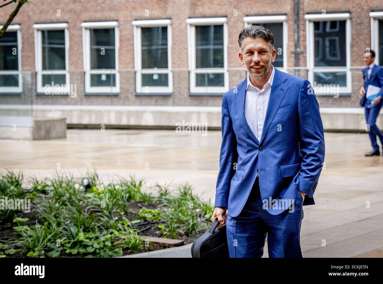 THE HAGUE - Outgoing Frank Rijkaart, Minister of the Interior and ...