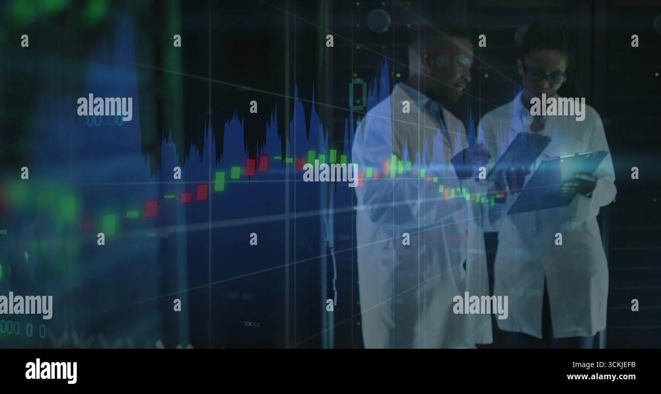 Lab scientists reviewing tablet data hi-res stock photography and ...