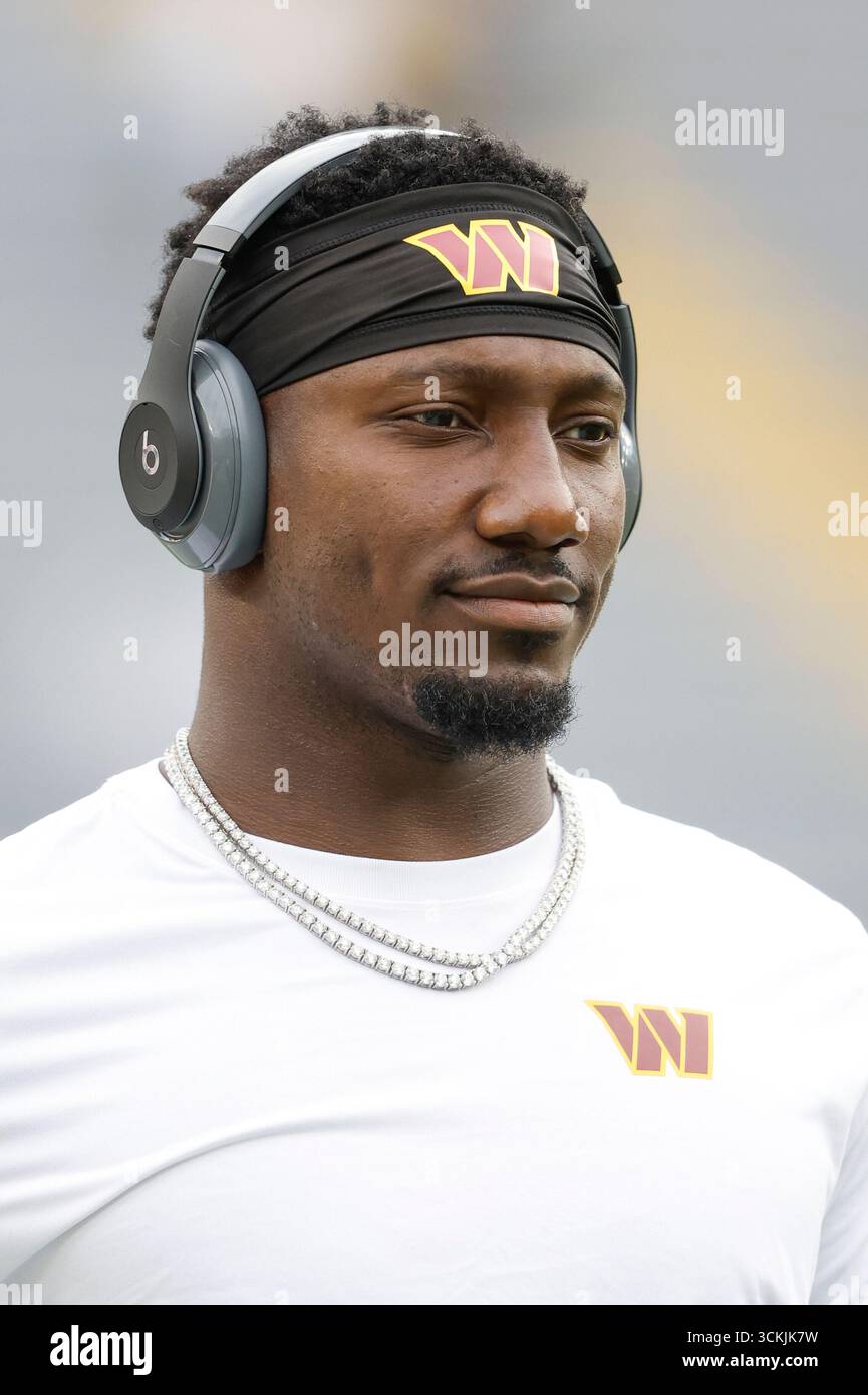 Washington Commanders wide receiver Deebo Samuel (1) walks on the field ...