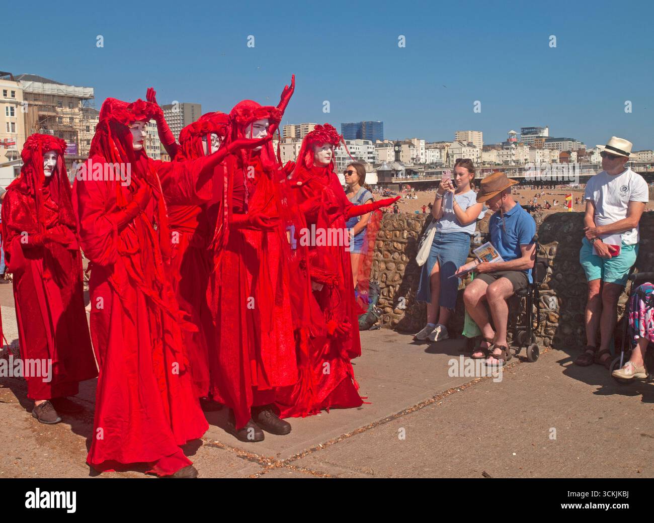 The Red Rebel Brigade of the protest group, Extinction Rebellion ...