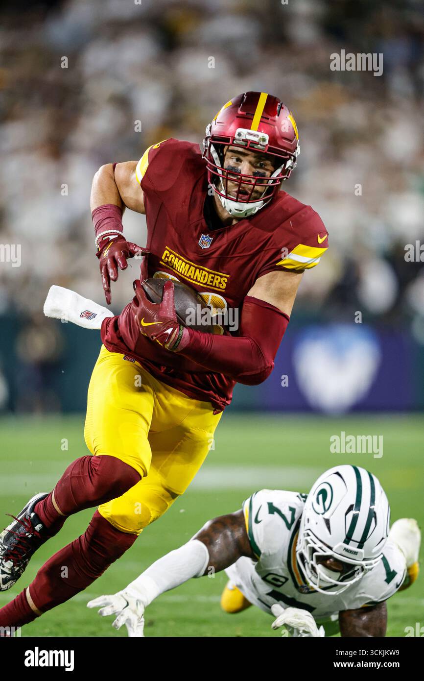 Washington Commanders tight end Zach Ertz (86) runs for a touchdown ...