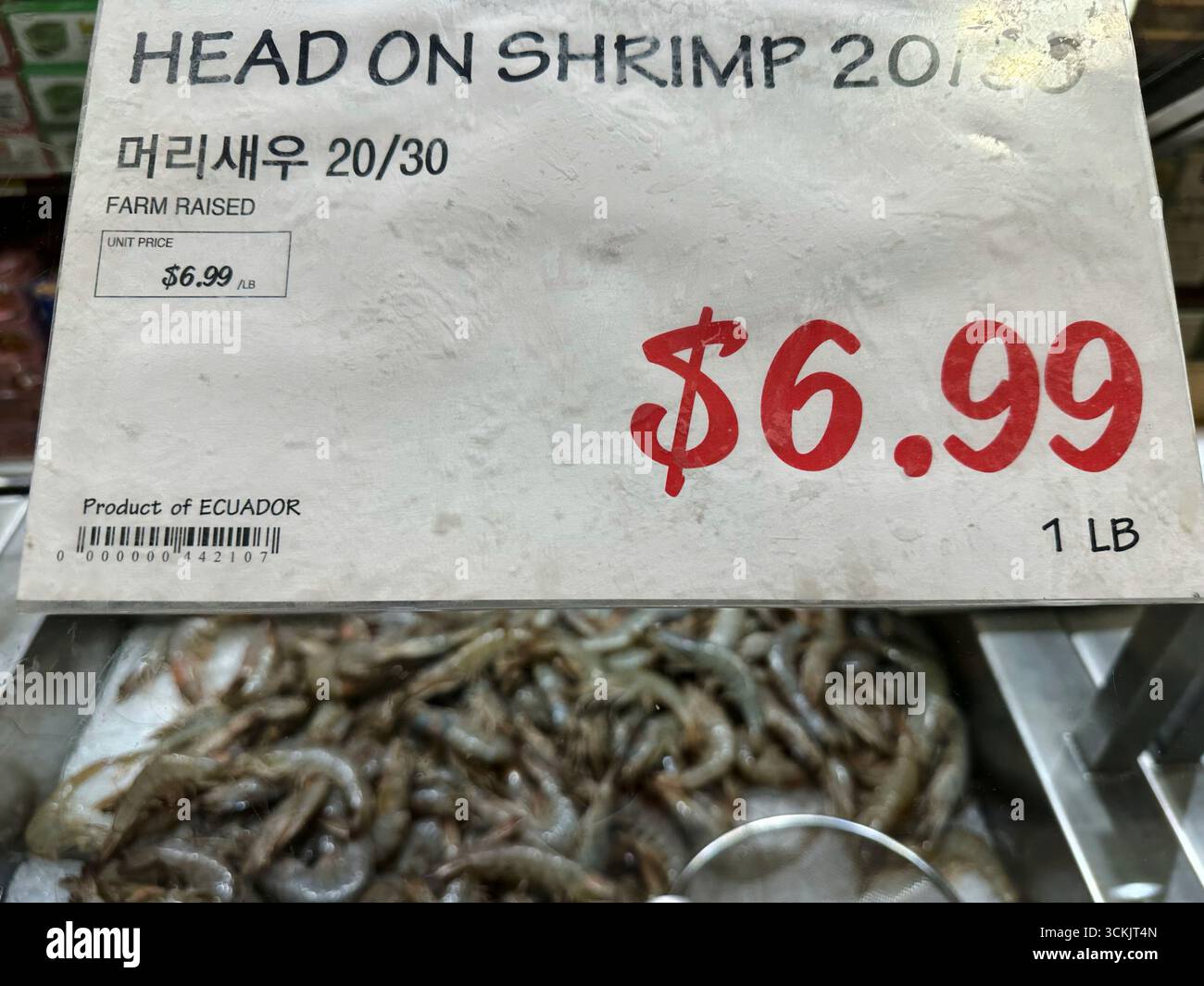Head on shrimp from Ecuador sign is seen at an Asian grocery store in ...