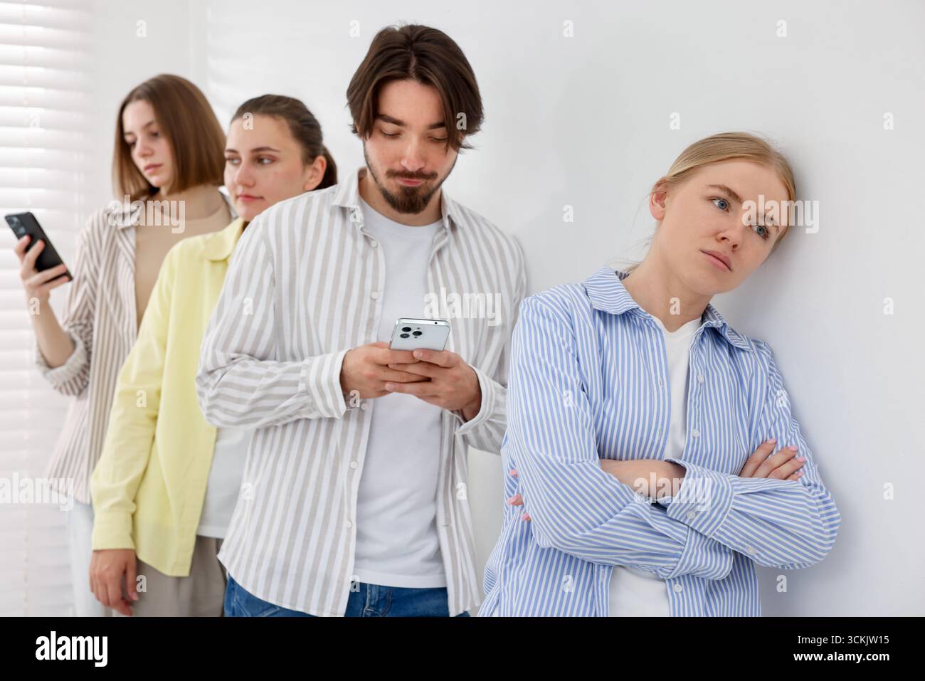 People standing waiting in line for job interview hi-res stock ...