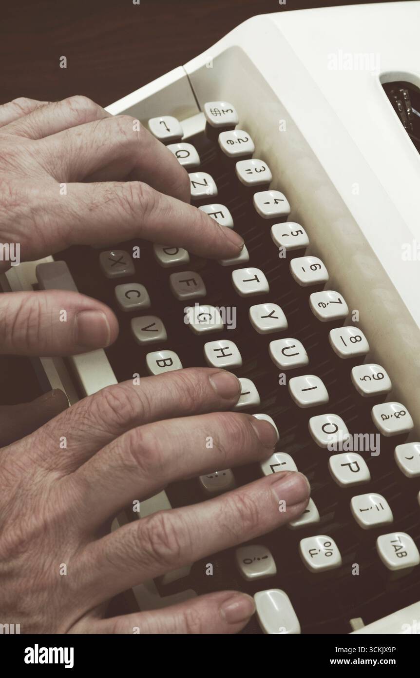 Writer typing on vintage hi-res stock photography and images - Alamy