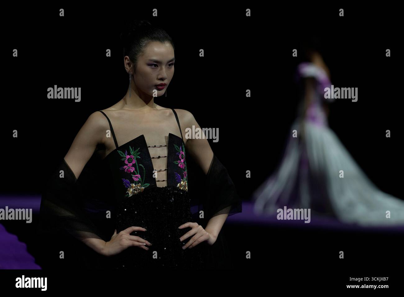 A model presents a creation from Lafaveur by Sharon Guan during the SS2026 China Fashion Week ...