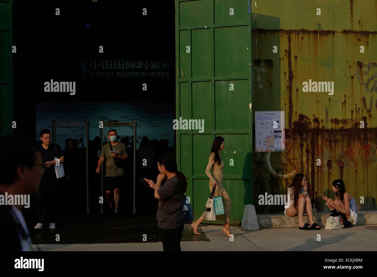 People leave after attending a fashion show featuring creations from Lafaveur by Sharon Guan ...