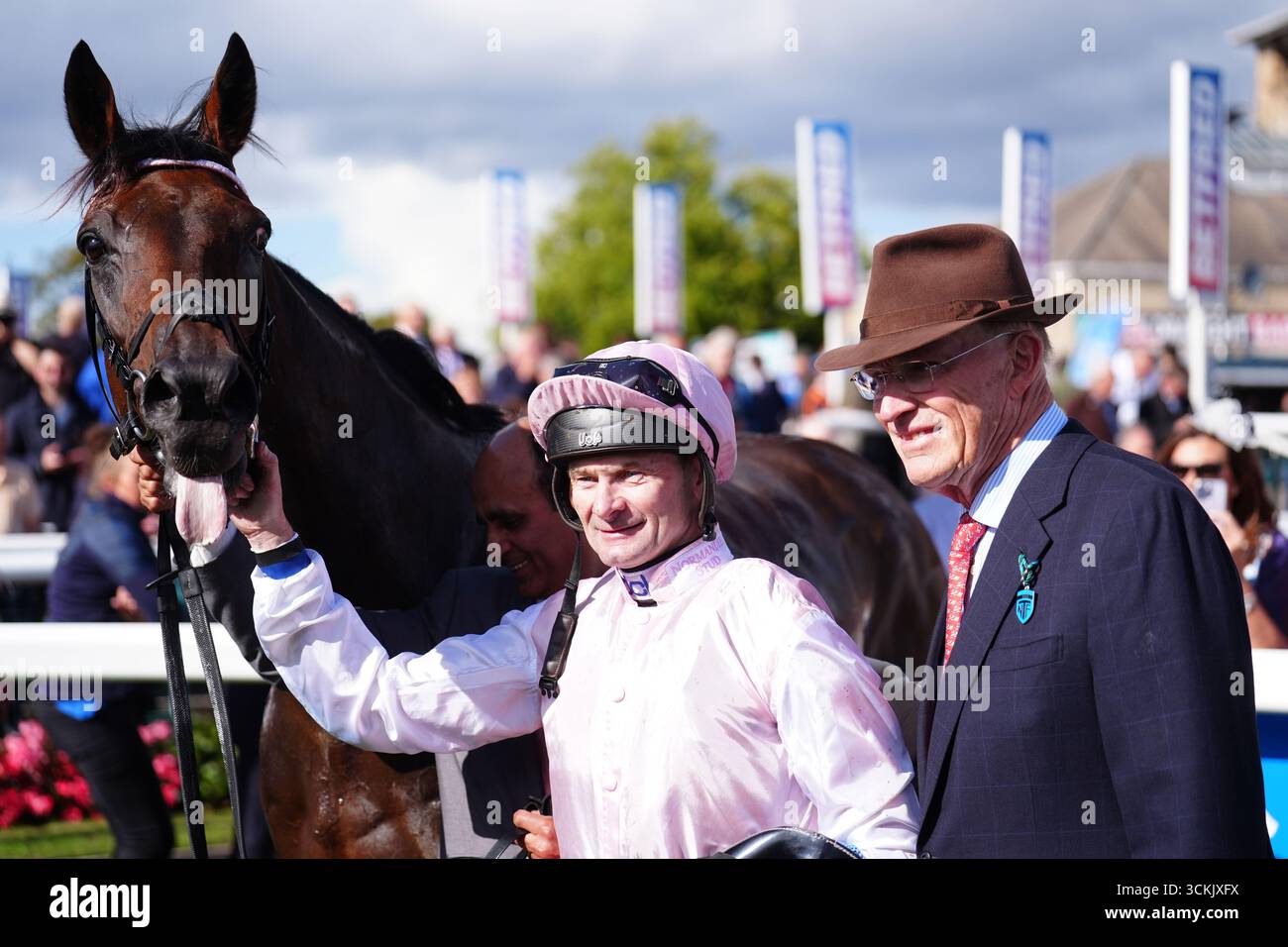 Sweet William with jockey Robert Havlin and trainer John Gosden after ...