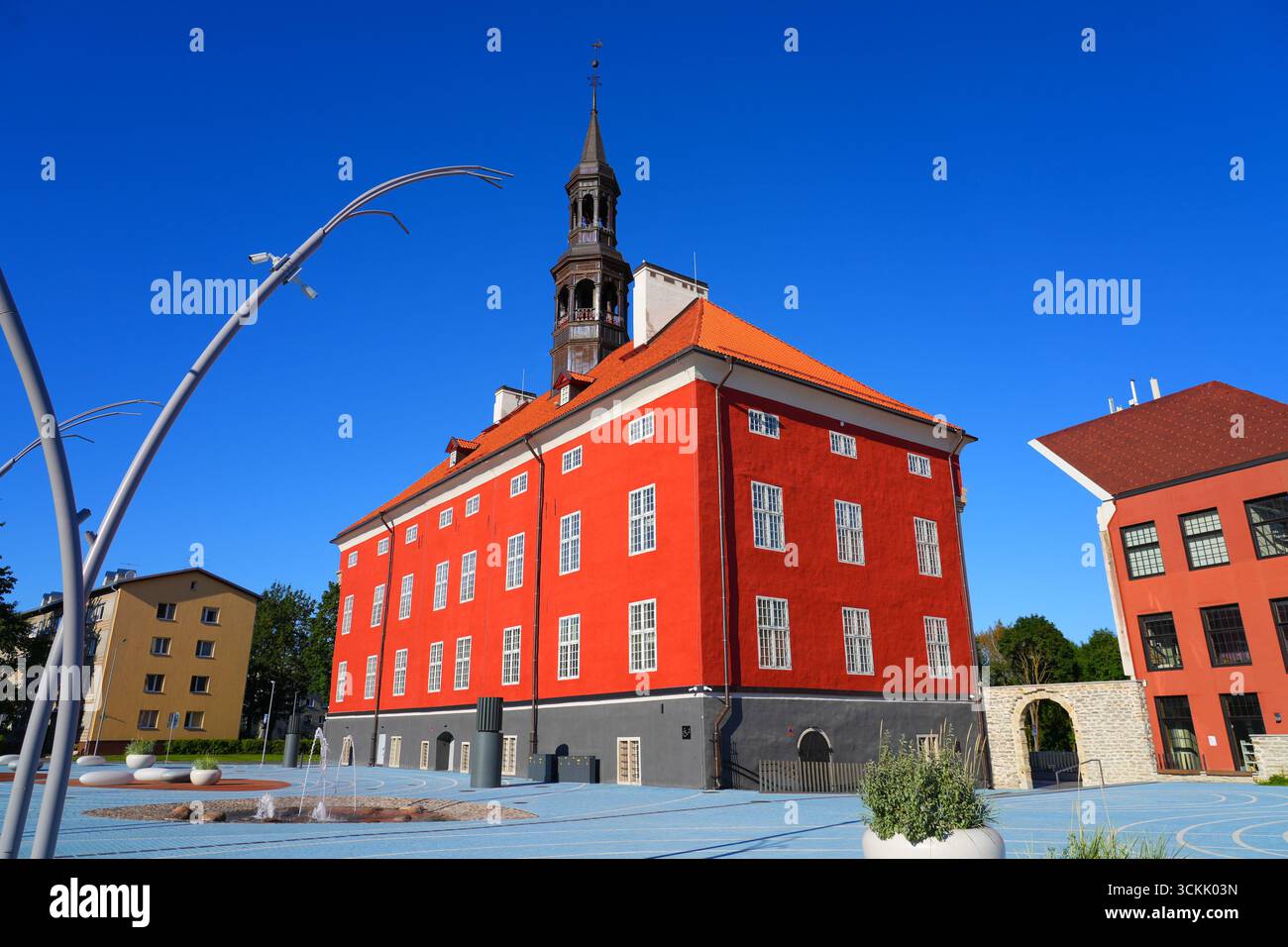 Narva Town Hall, renovated in 2023 with a new red facade, in the ...
