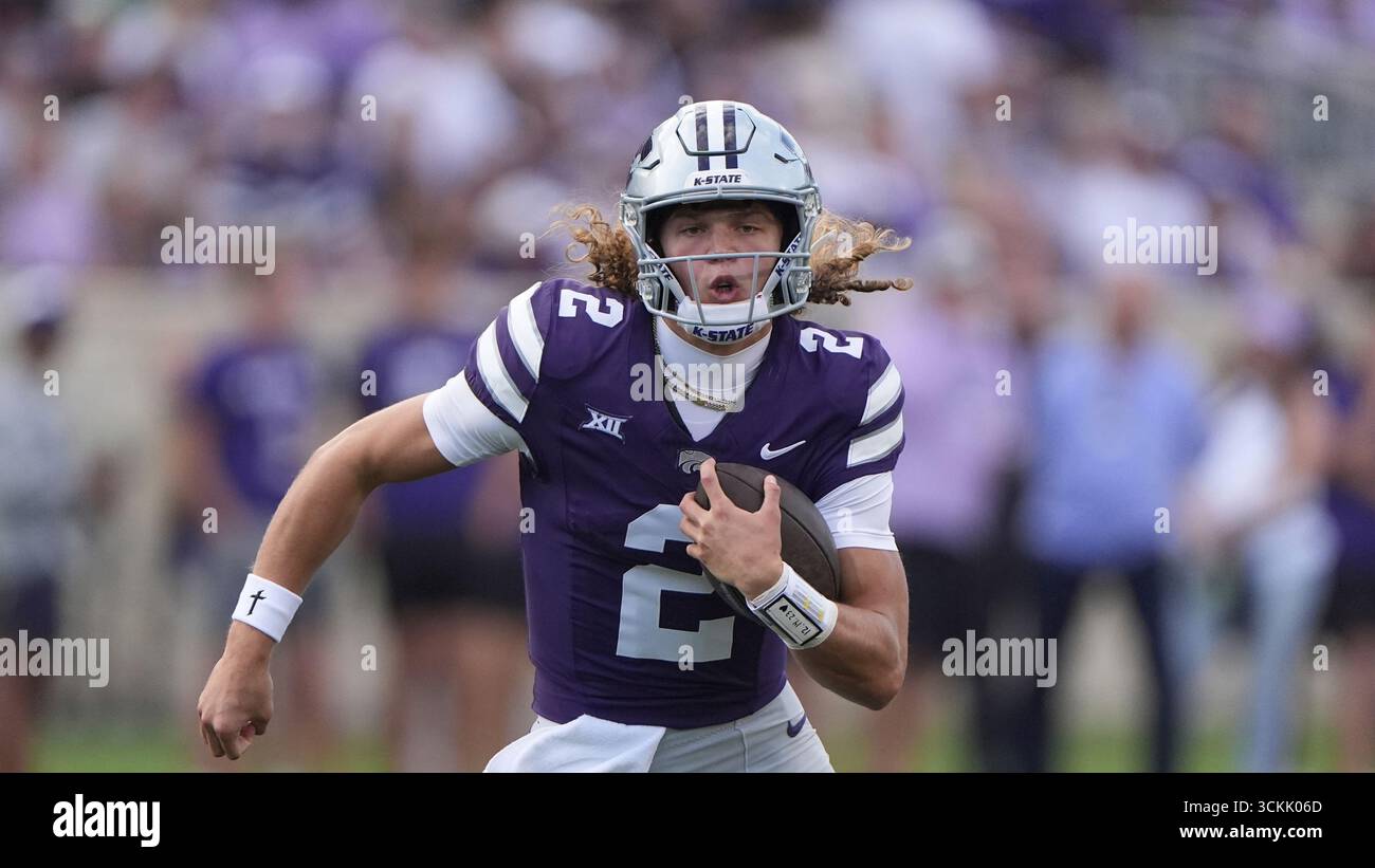 Kansas State quarterback Avery Johnson runs the ball during the first half of an NCAA college ...