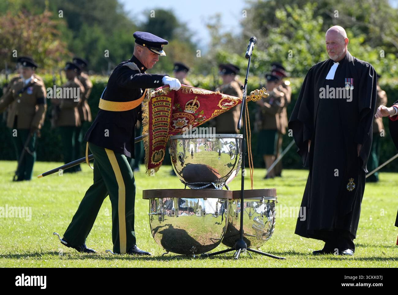 The new standard for the Royal Dragoon Guards is laid on a drum altar ...