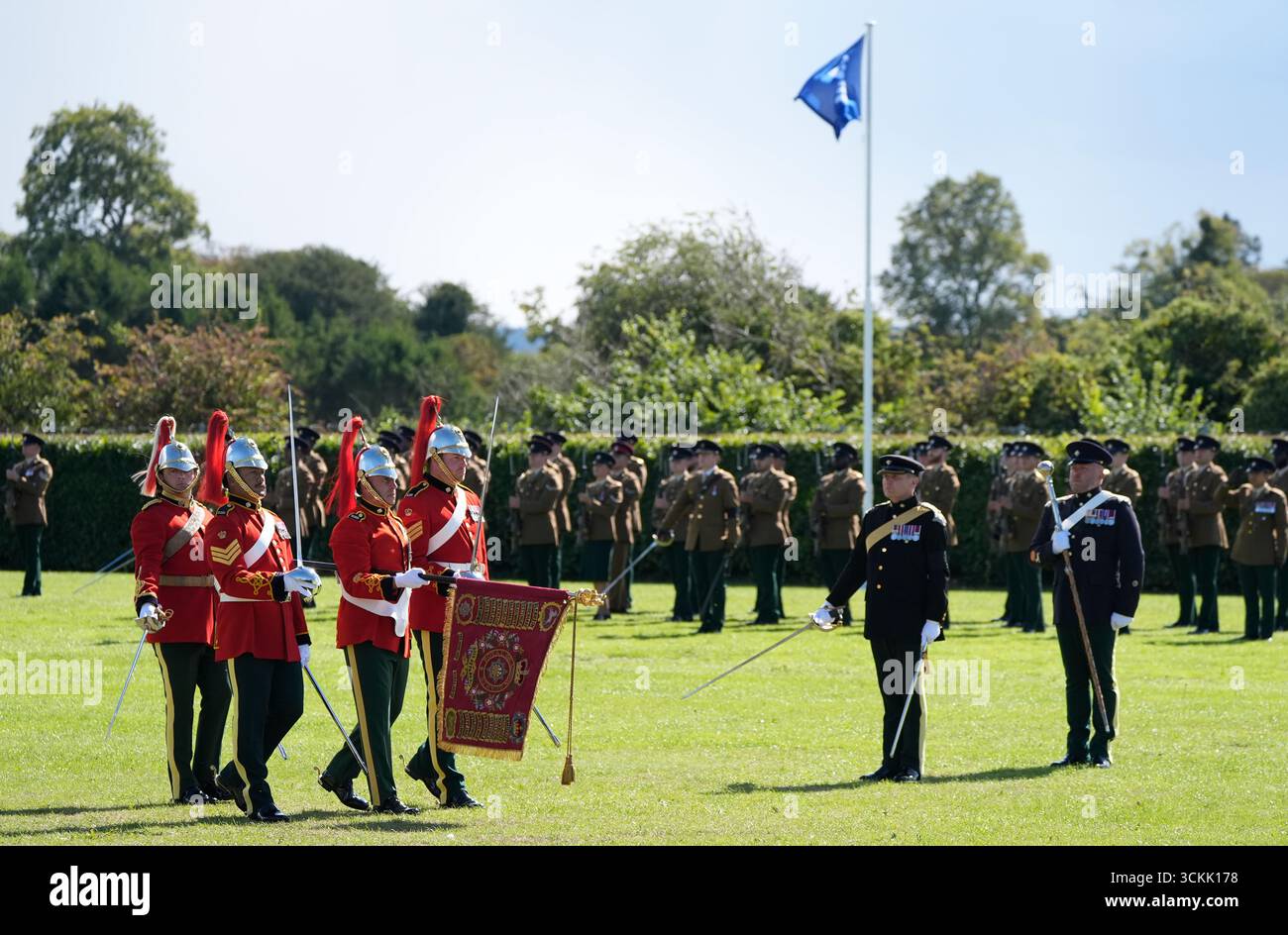 Members of the Royal Dragoon Guards standard party parade the regiment ...