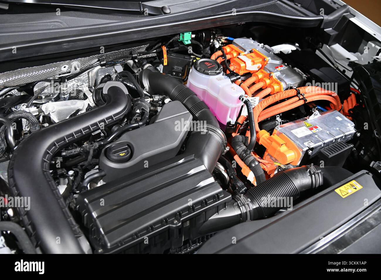 Munich, Deutschland. 12th Sep, 2025. Volkswagen stand, hybrid engine in ...