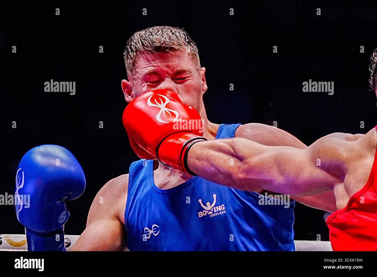 Scotland's Robert McNulty (Blue) and Austria's Michael Derouiche (Red ...