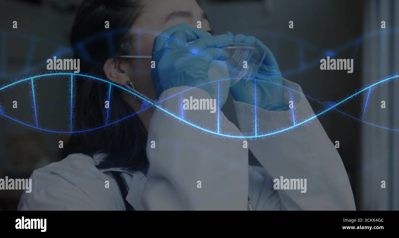 Scientist wearing lab coat and blue gloves raising safety goggles in ...
