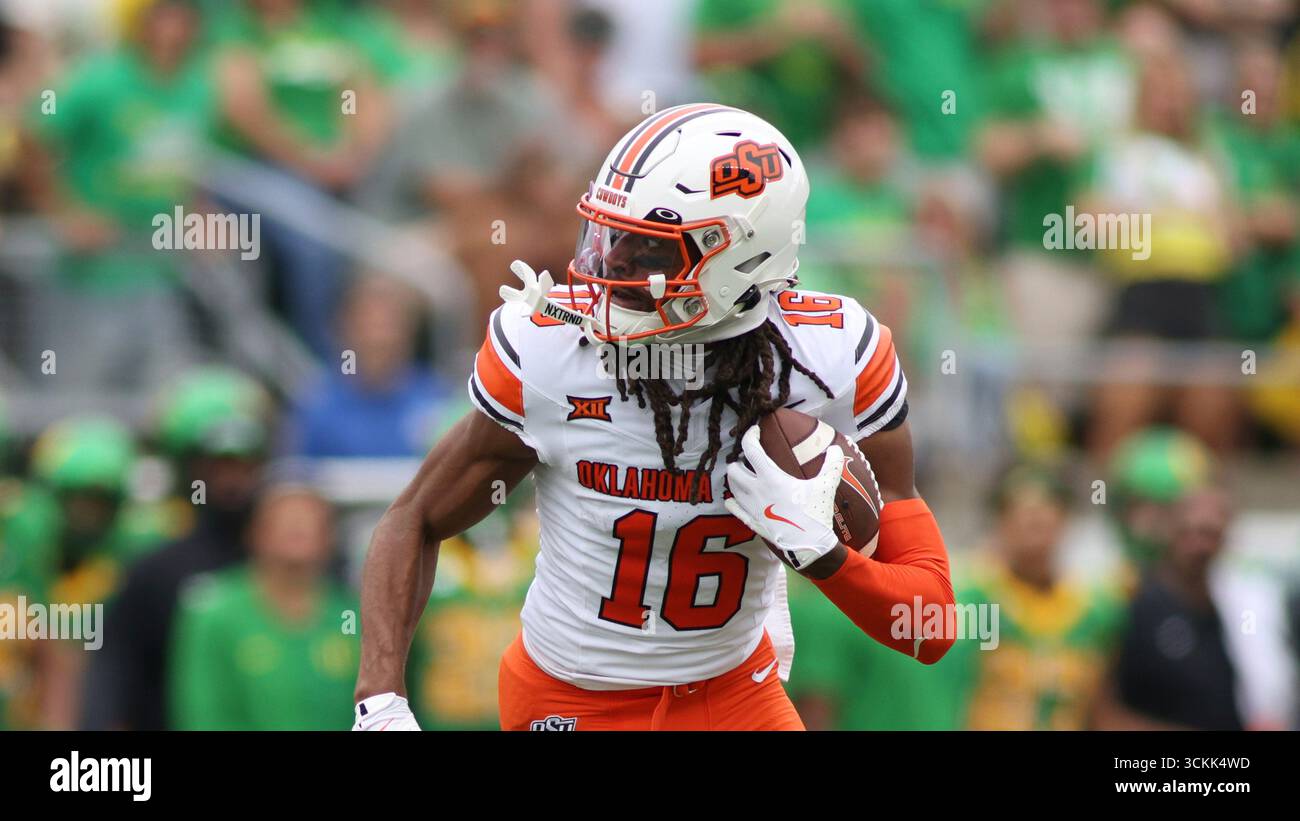 Oklahoma State wide receiver Christian Fitzpatrick (16) runs the ball ...