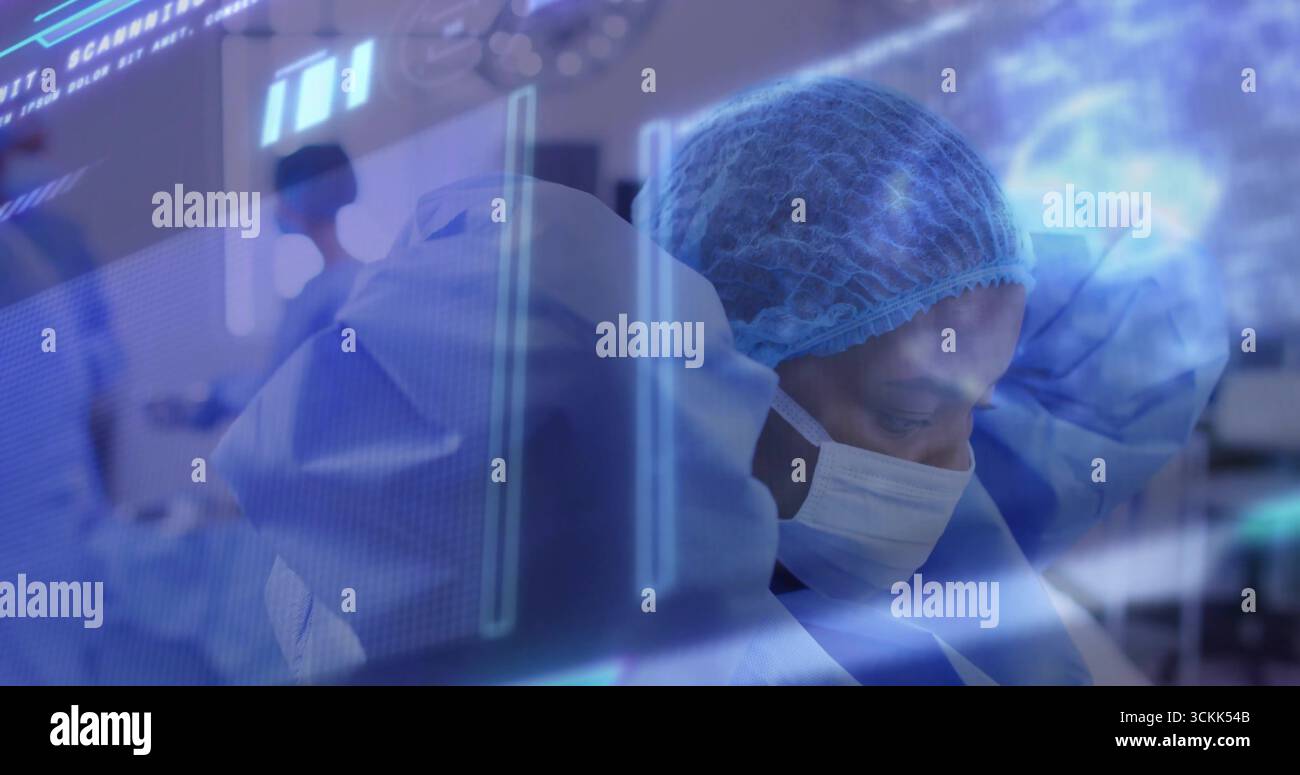 Surgeon in scrubs performing surgery in operating room with instruments ...