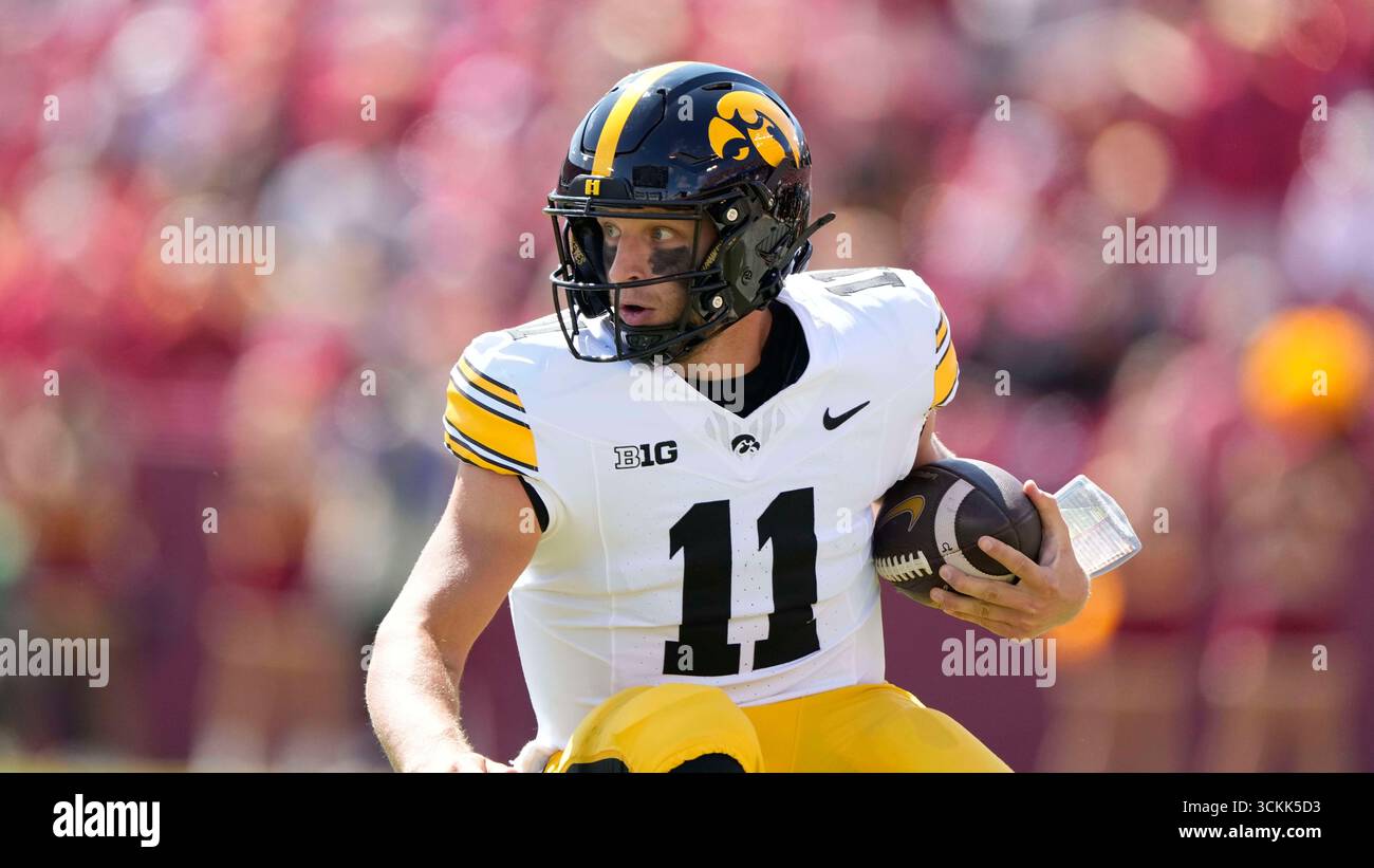 Iowa quarterback Mark Gronowski runs up field during the first half of ...