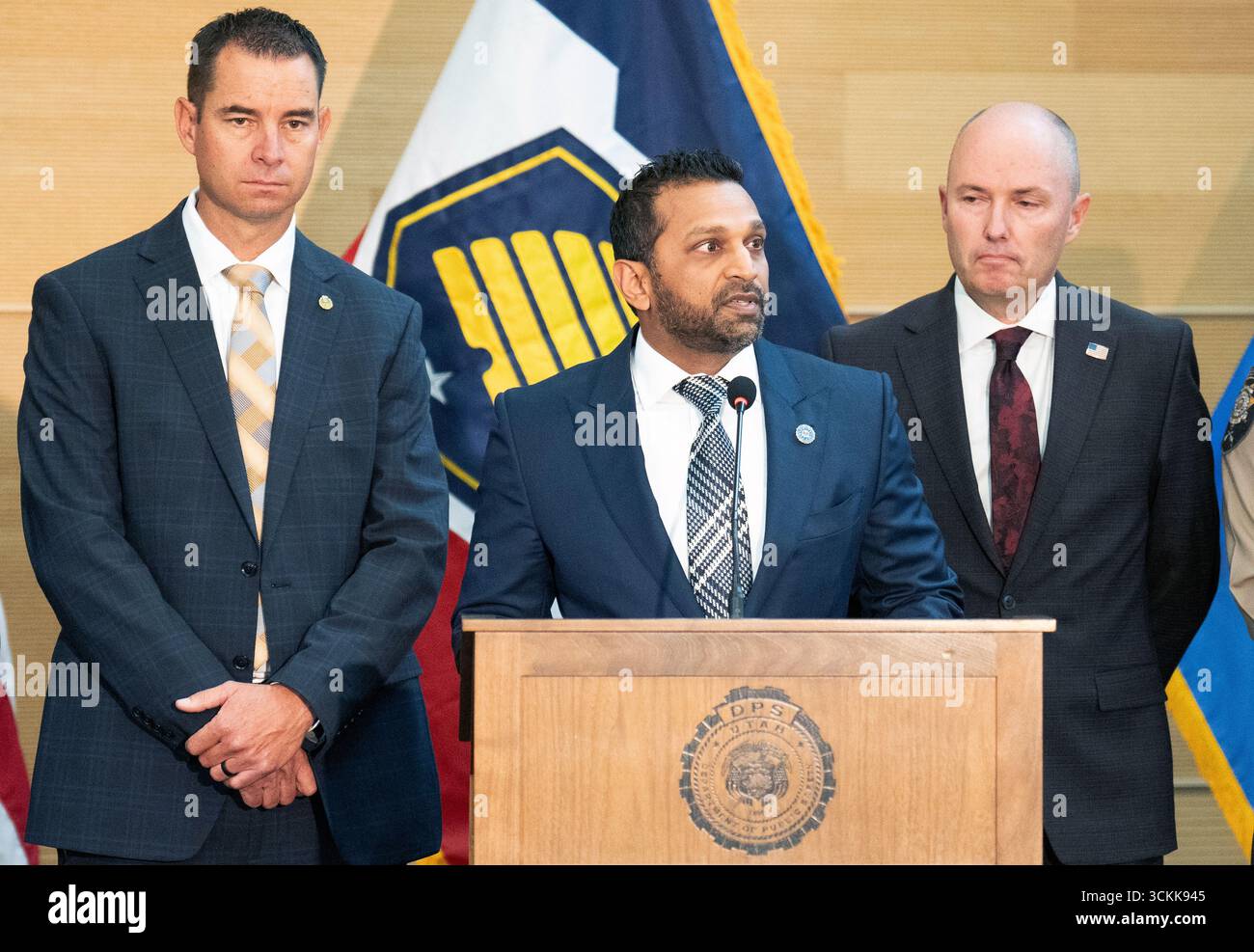 FBI Director Kash Patel (C) stands with Utah Governor Spenser Cox (R ...