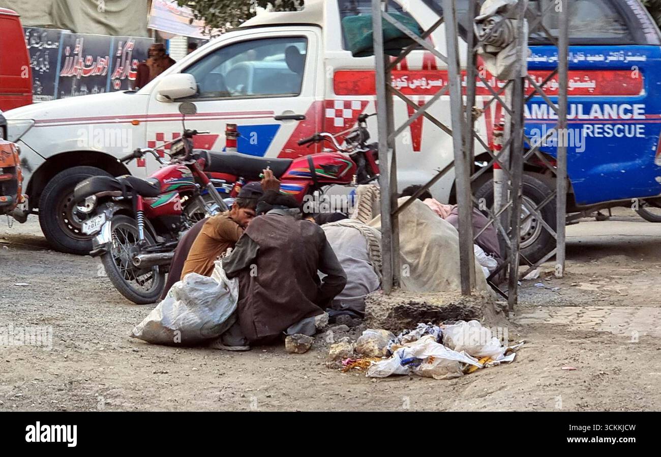 QUETTA, PAKISTAN, SEP 12: Drug-addicts are taking drugs openly, showing ...