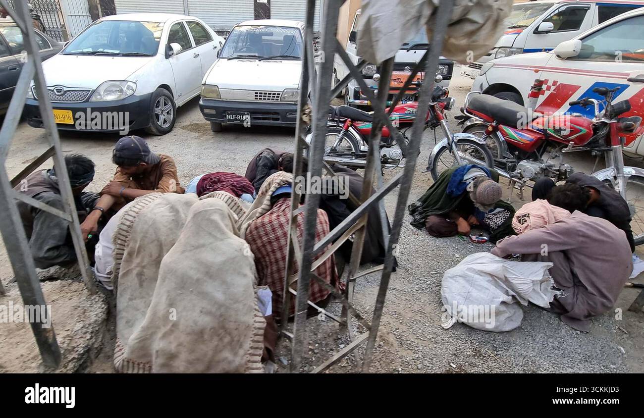 QUETTA, PAKISTAN, SEP 12: Drug-addicts are taking drugs openly, showing ...
