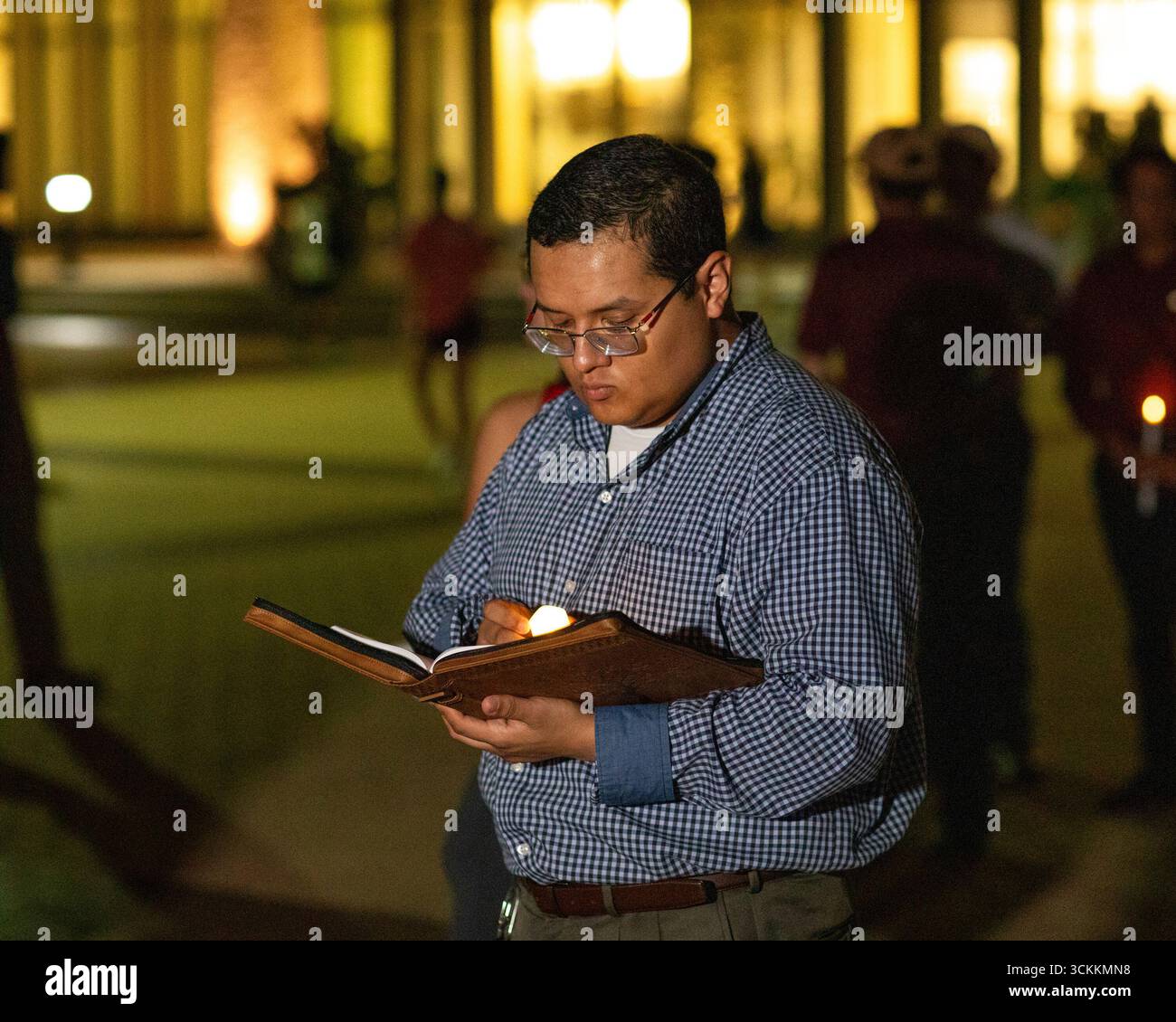 People gather prior to a vigil for Charlie Kirk at Rudder Plaza on the ...
