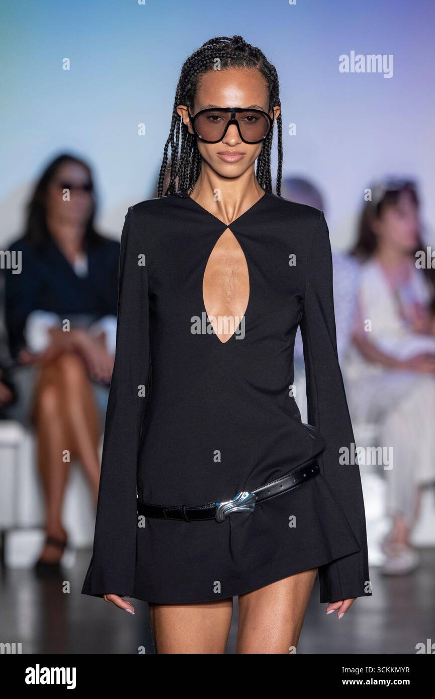 A model is seen on the catwalk at the Kate Barton fashion show during ...