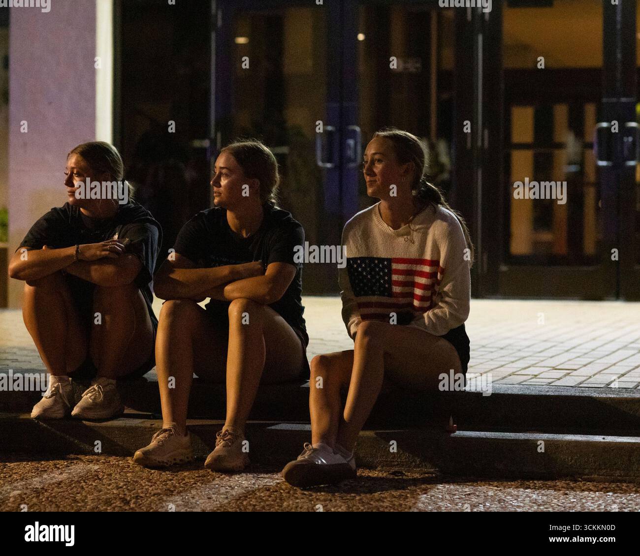 People gather prior to a vigil for Charlie Kirk at Rudder Plaza on the ...