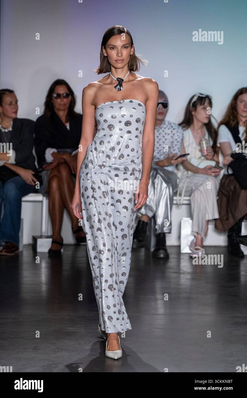 A model is seen on the catwalk at the Kate Barton fashion show during ...