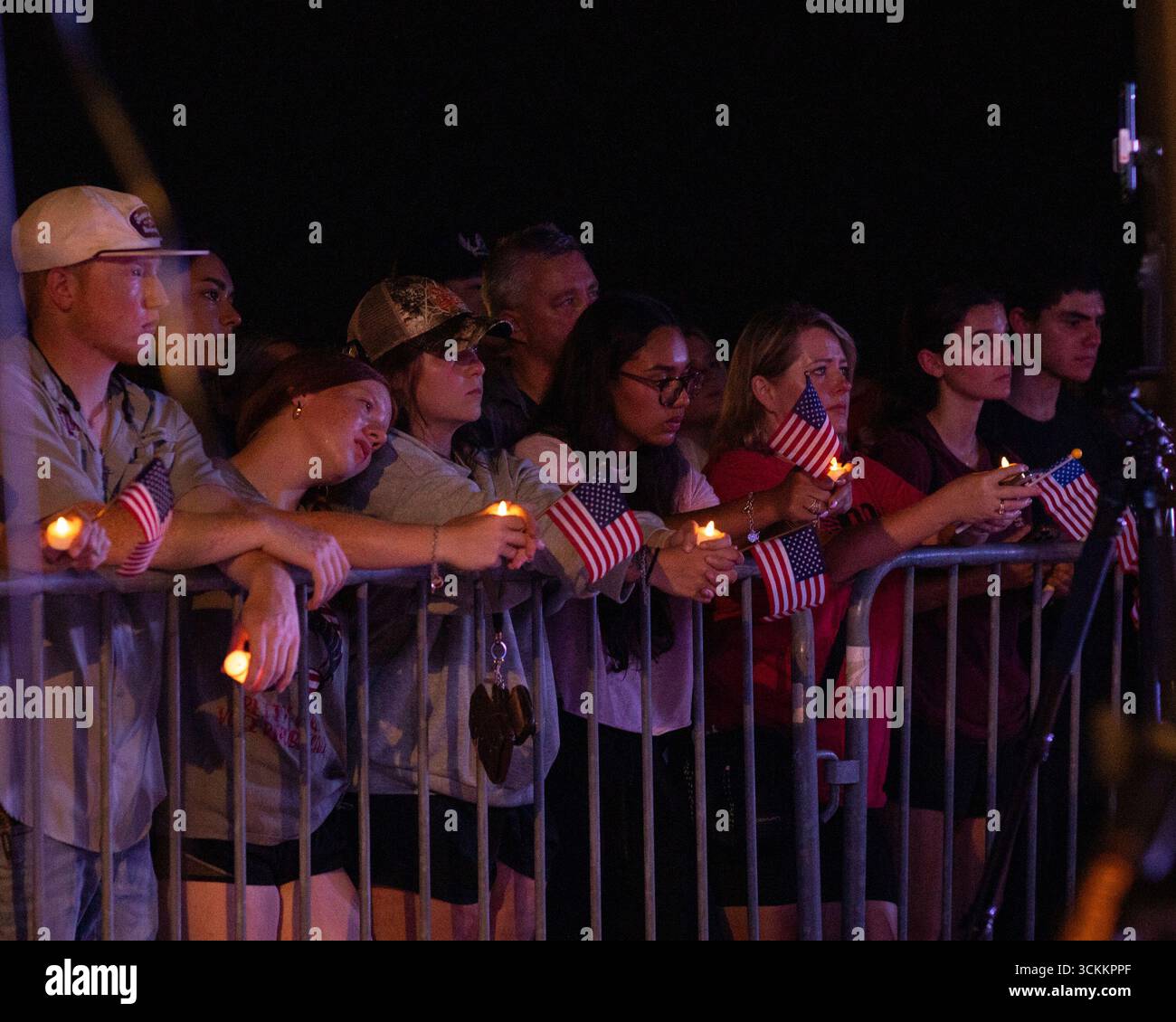 Attendees gather for a vigil for Charlie Kirk at Rudder Plaza on the ...