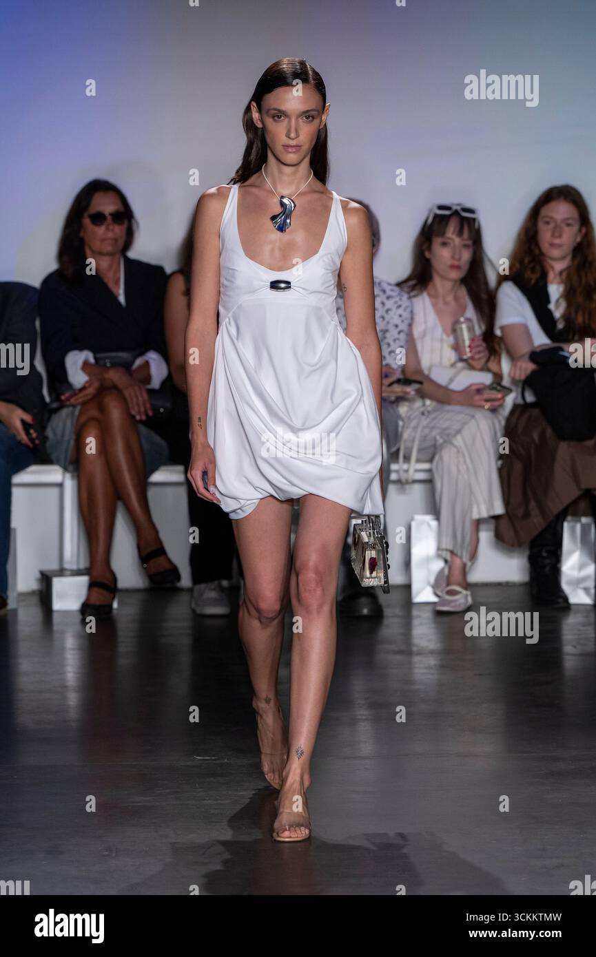A model is seen on the catwalk at the Kate Barton fashion show during ...