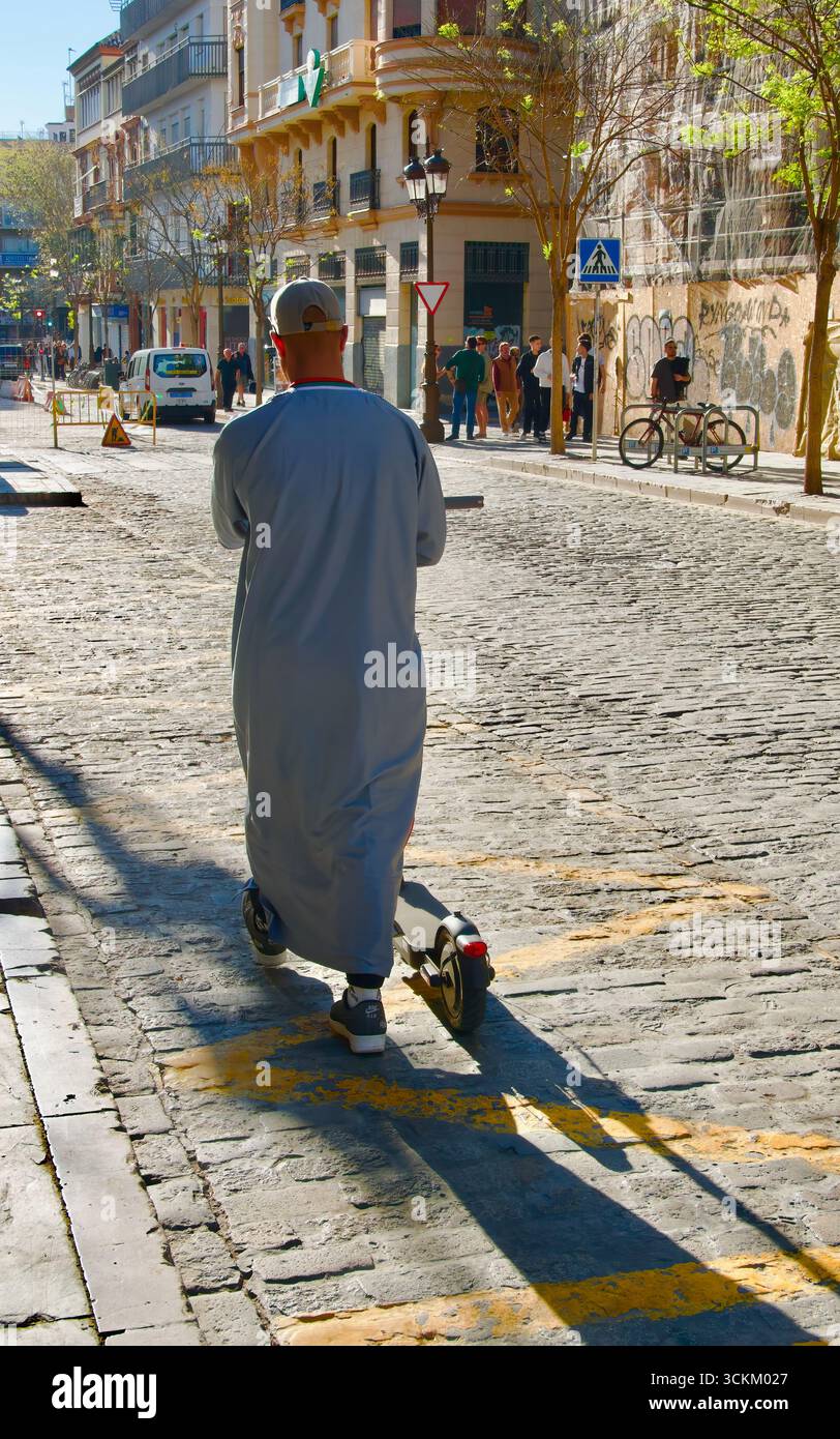 Pushing an electric scooter hi-res stock photography and images - Alamy
