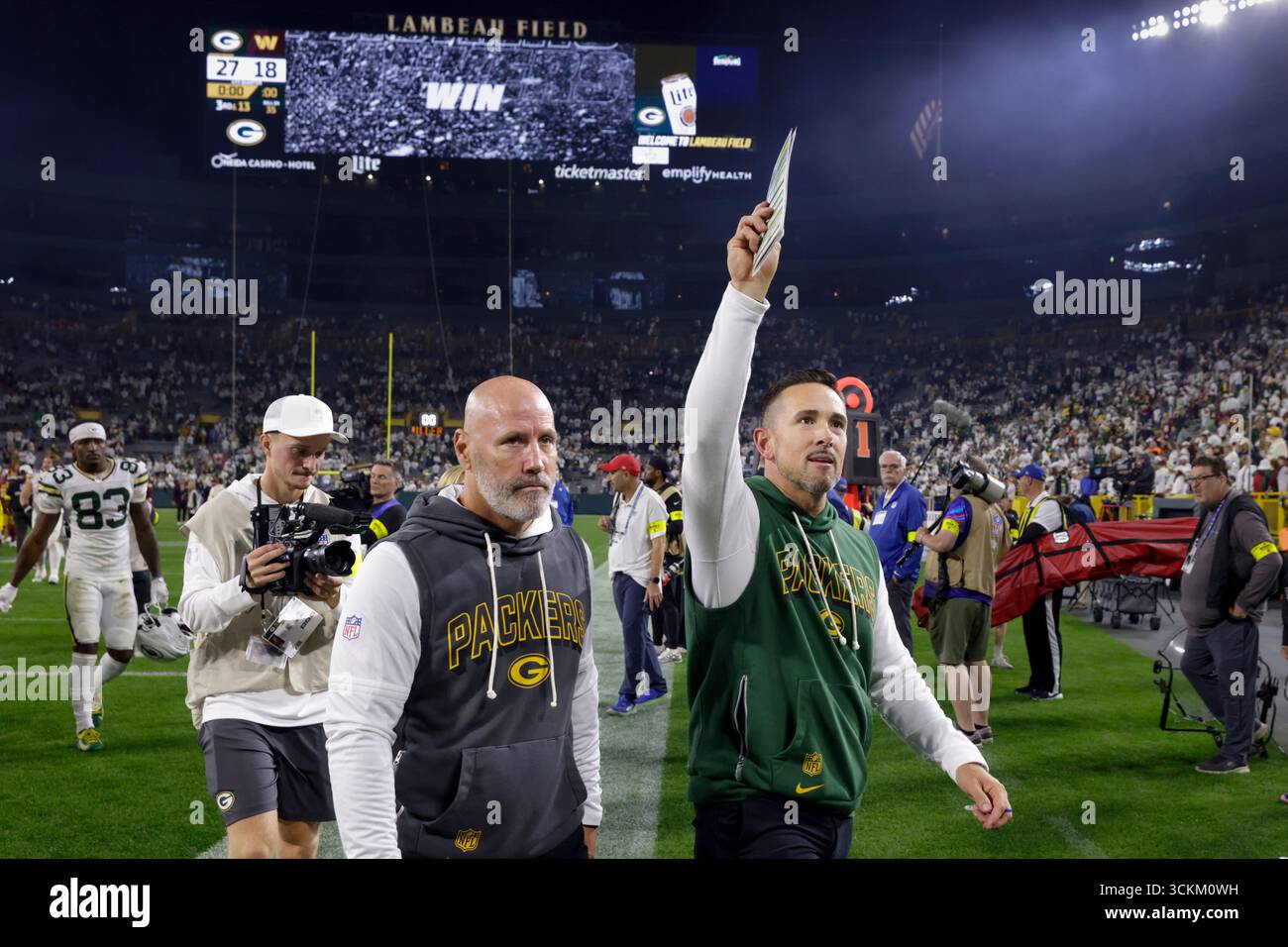 Green Bay Packers head coach Matt LaFleur celebrates following an NFL ...