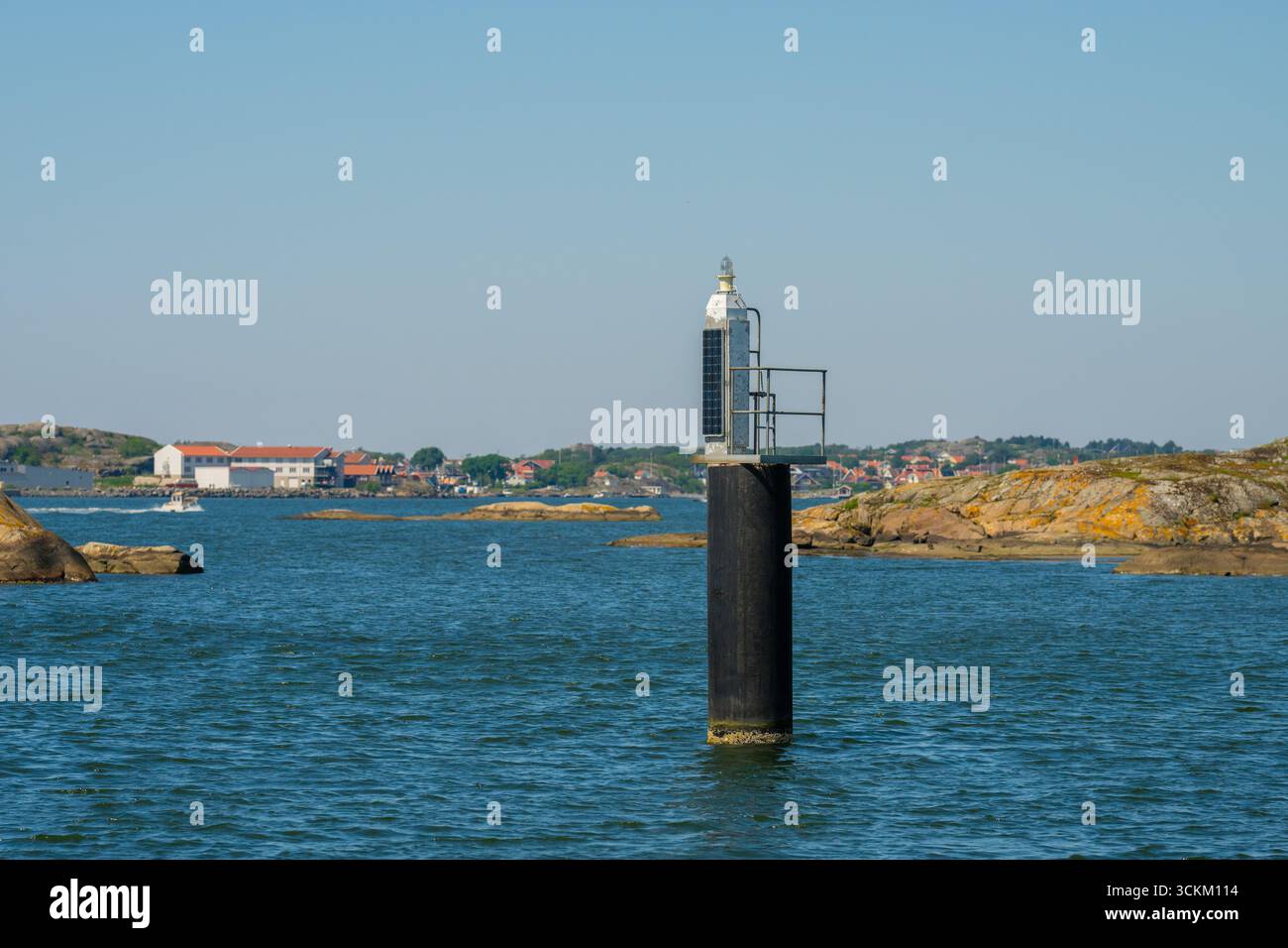 Solar powered navigational light on a pole Stock Photo - Alamy