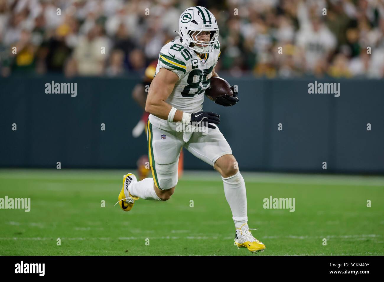 Green Bay Packers tight end Tucker Kraft (85) runs after making a catch ...