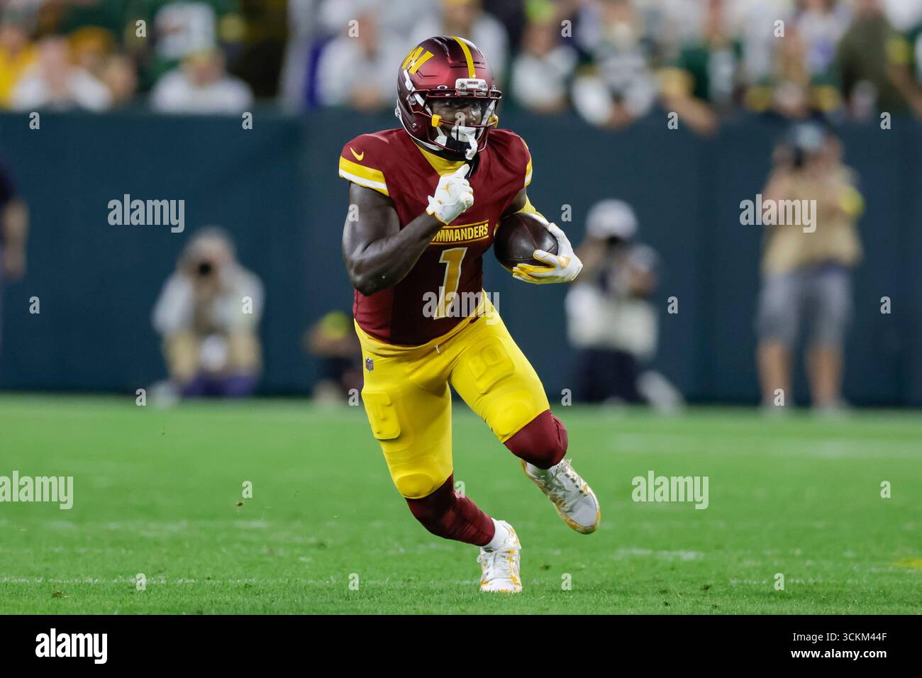Washington Commanders wide receiver Deebo Samuel (1) runs after making ...