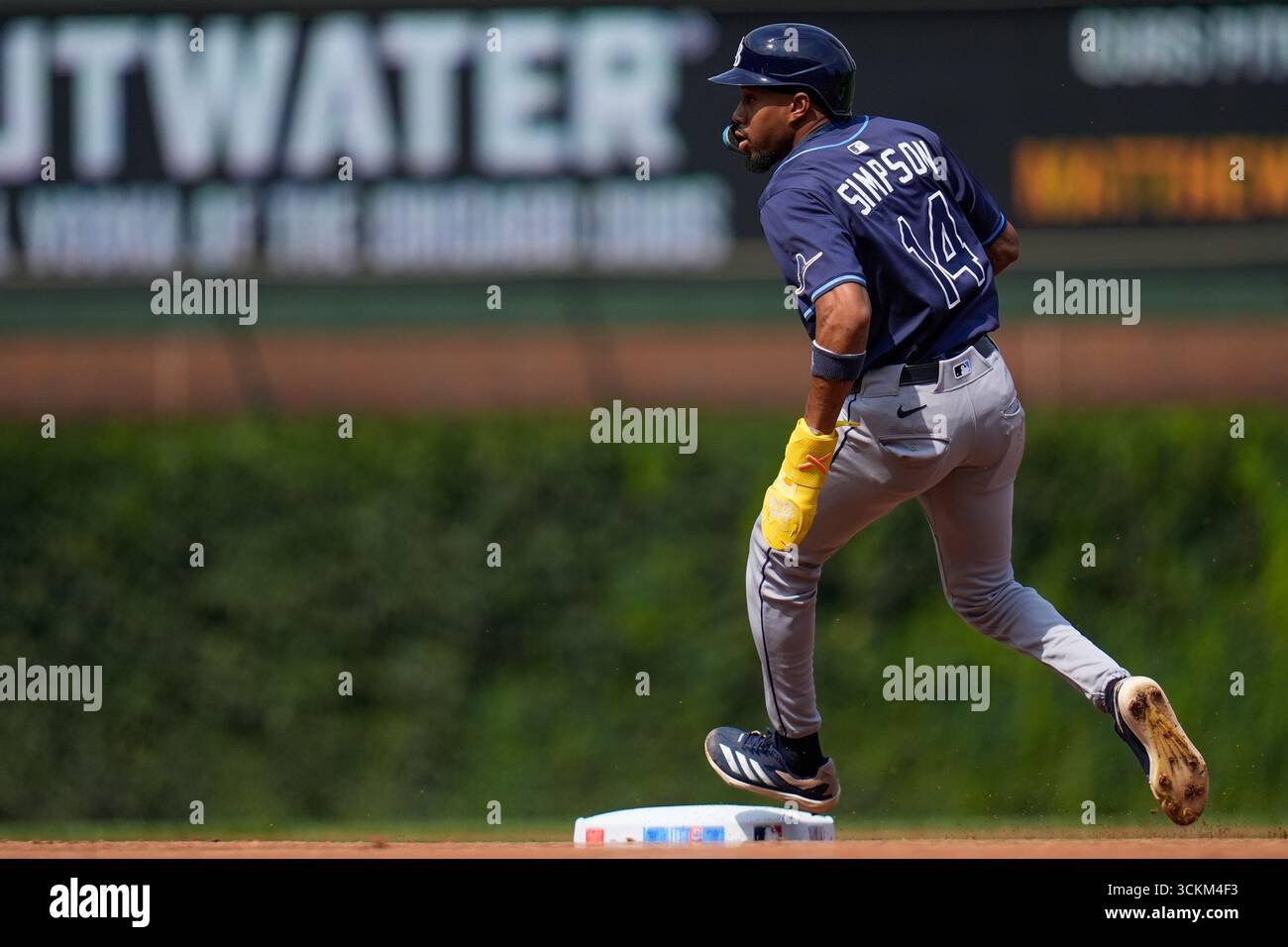 Tampa Bay Rays' Chandler Simpson (14) advances to second on a wild ...