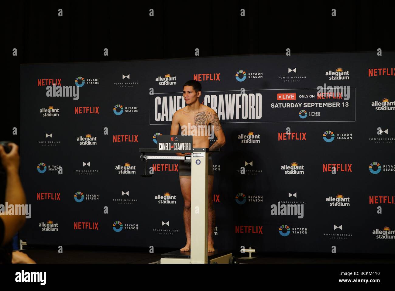 LAS VEGAS, NV - SEPTEMBER 12: Travis Crawford poses on the scale during the Canelo v Crawford ...