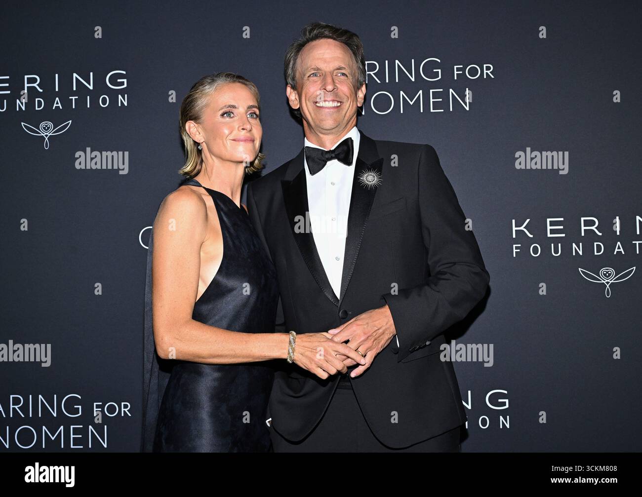 Alexi Ashe, left, and Seth Meyers attend the Kering Caring for Women ...